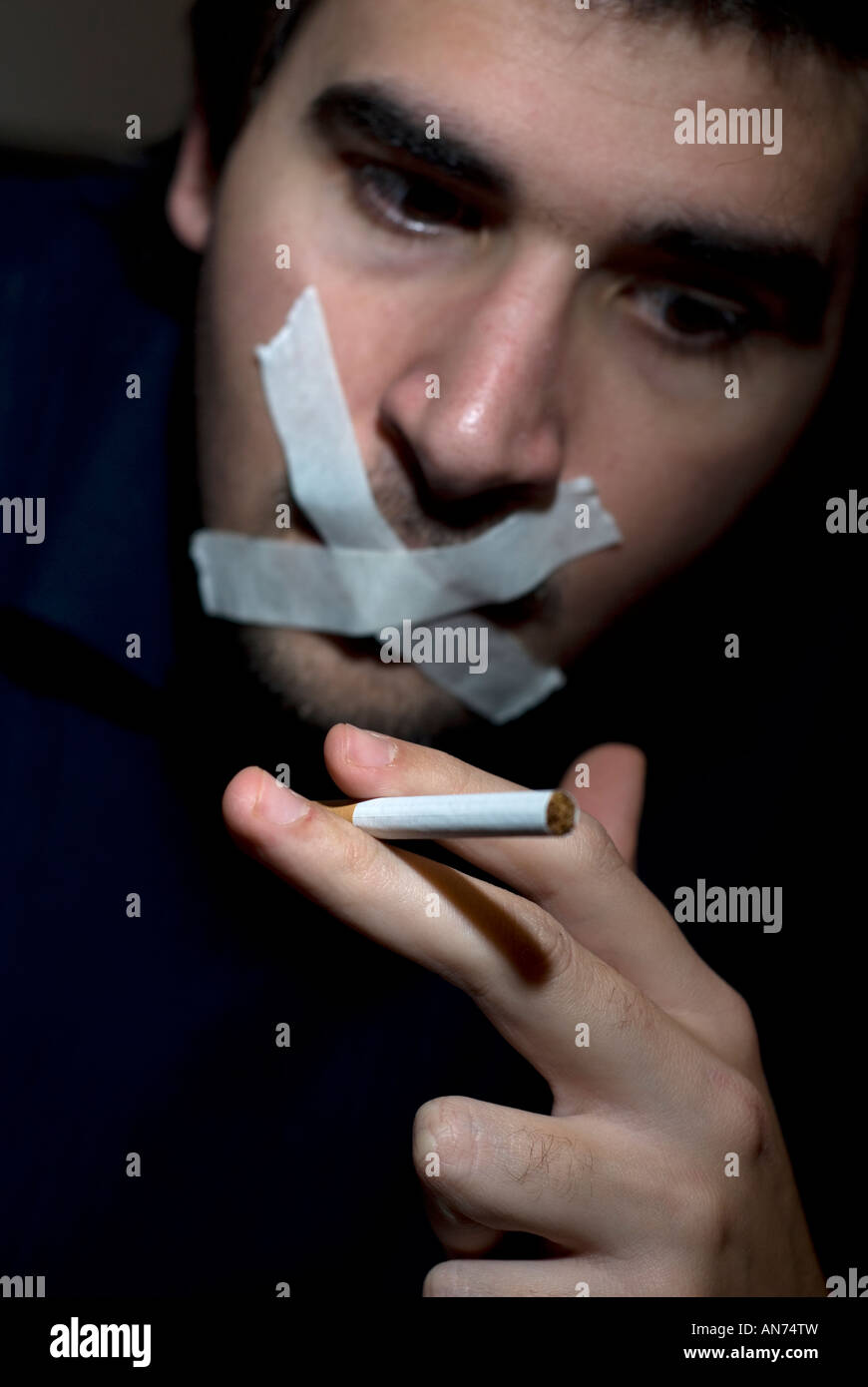 quitting smoking man Stock Photo - Alamy