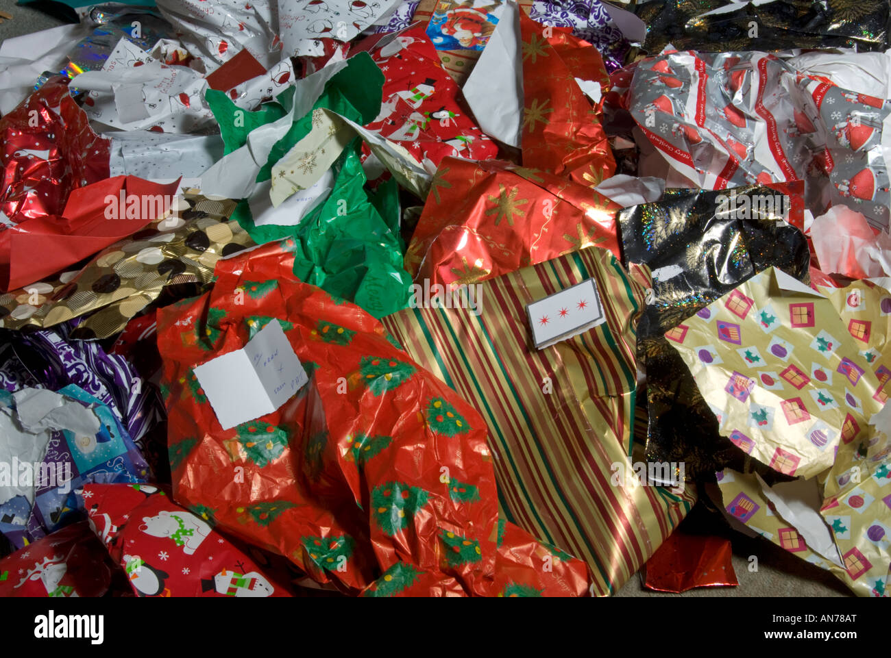 Discarded Christmas wrapping paper Stock Photo - Alamy