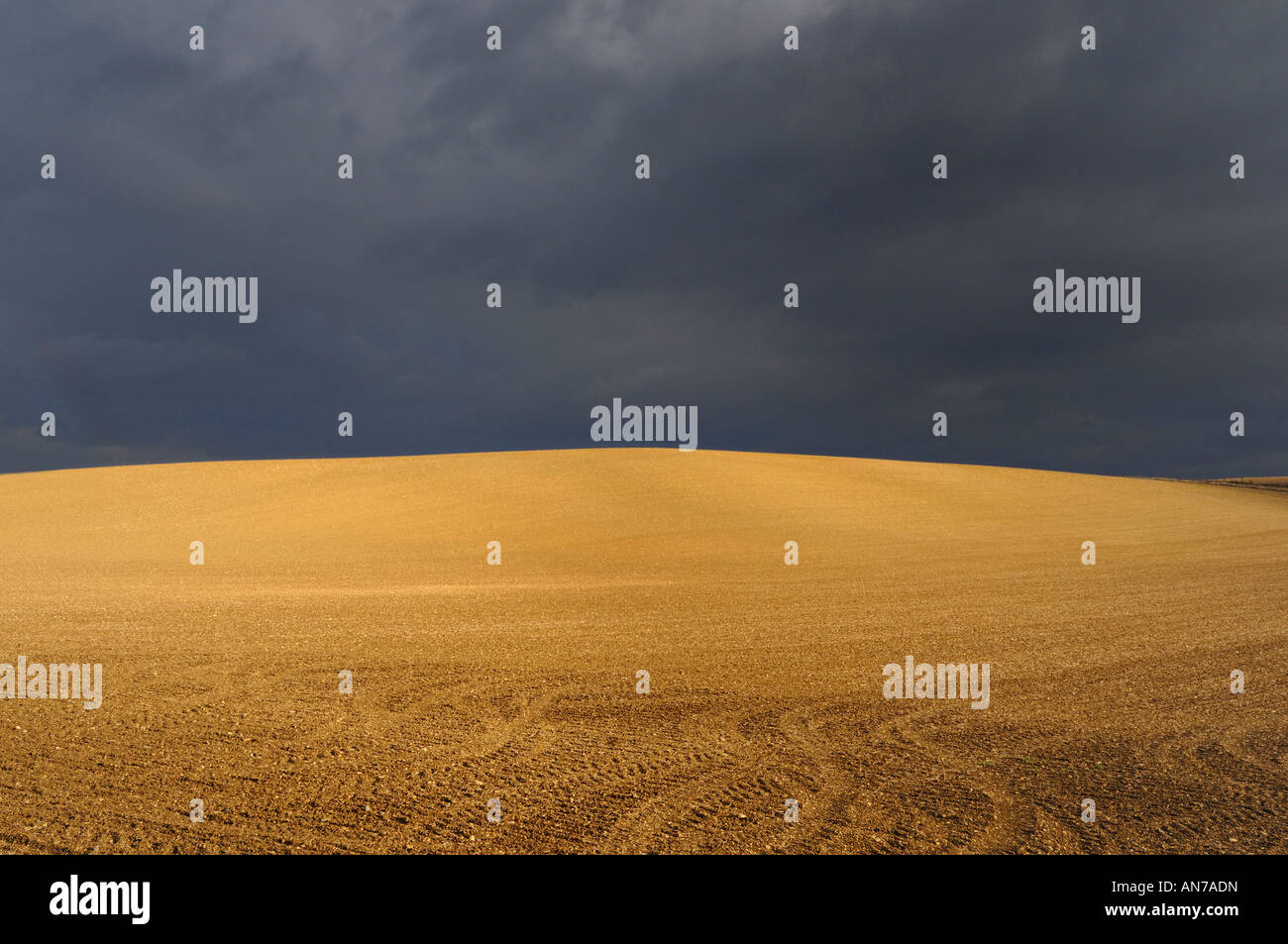Fields and dark clouds hi-res stock photography and images - Alamy