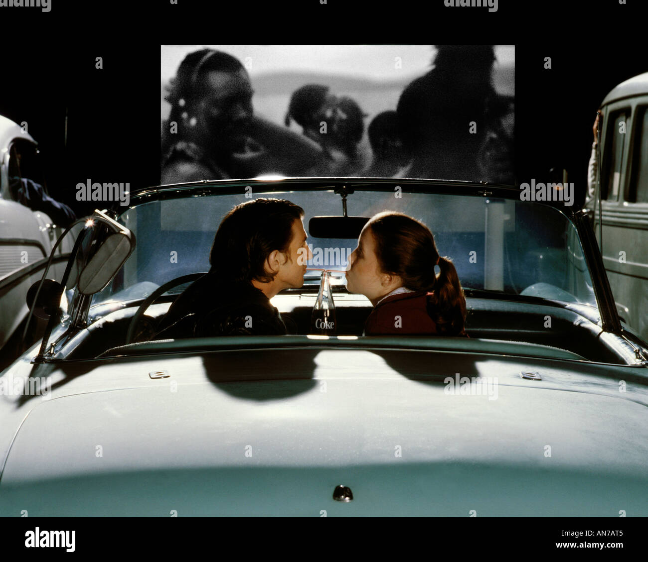 Couple drive in movie car hi-res stock photography and images - Alamy