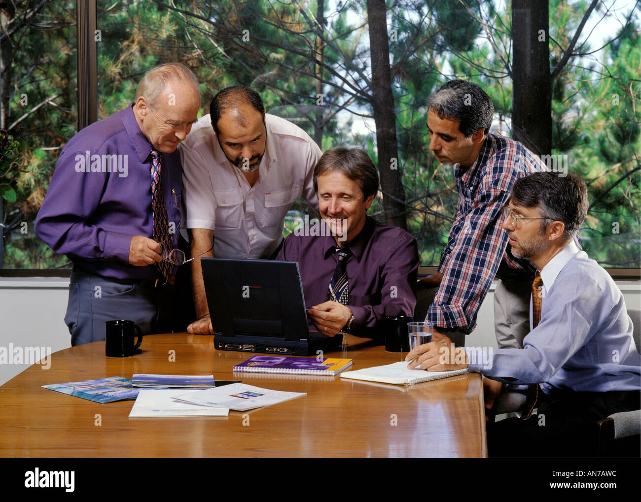 Business team of 3 with laptops hi-res stock photography and images - Alamy