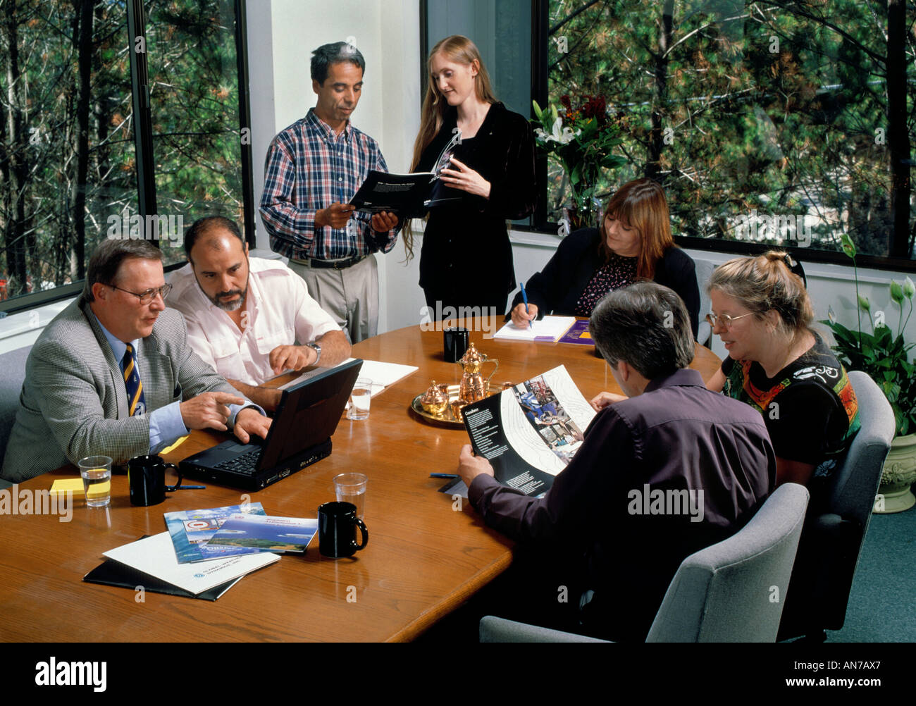 Men women participate in a BUSINESS MEETING model released Stock Photo ...