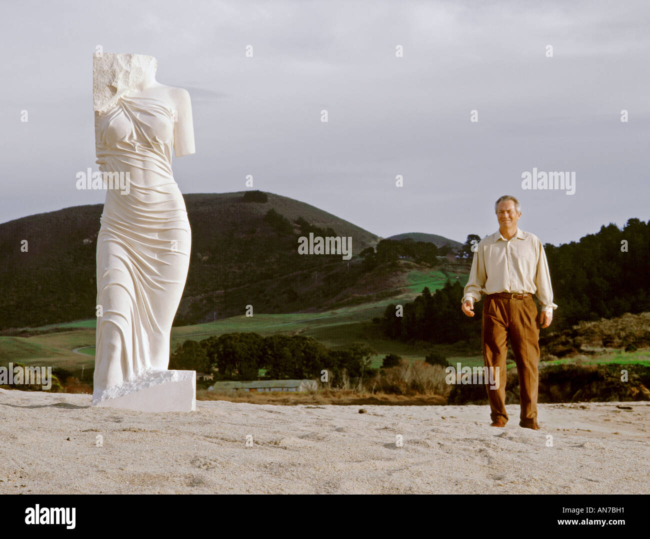 SCULPTURE carved from LIMESTONE of a full figured woman draped in cloth ...