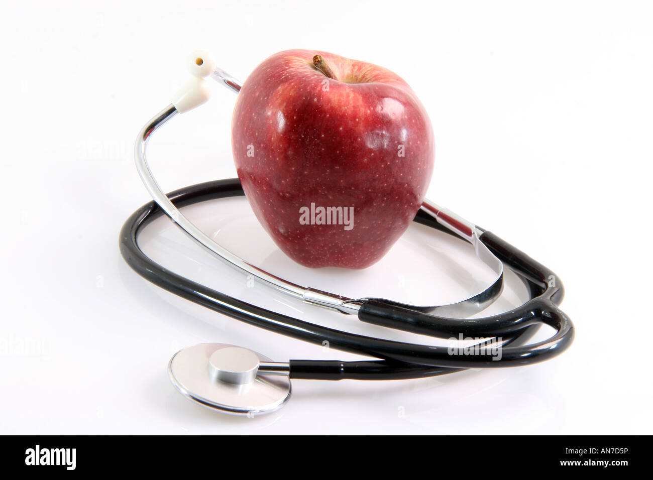 healthy food red apple and phonendoscope health and medical objects ...