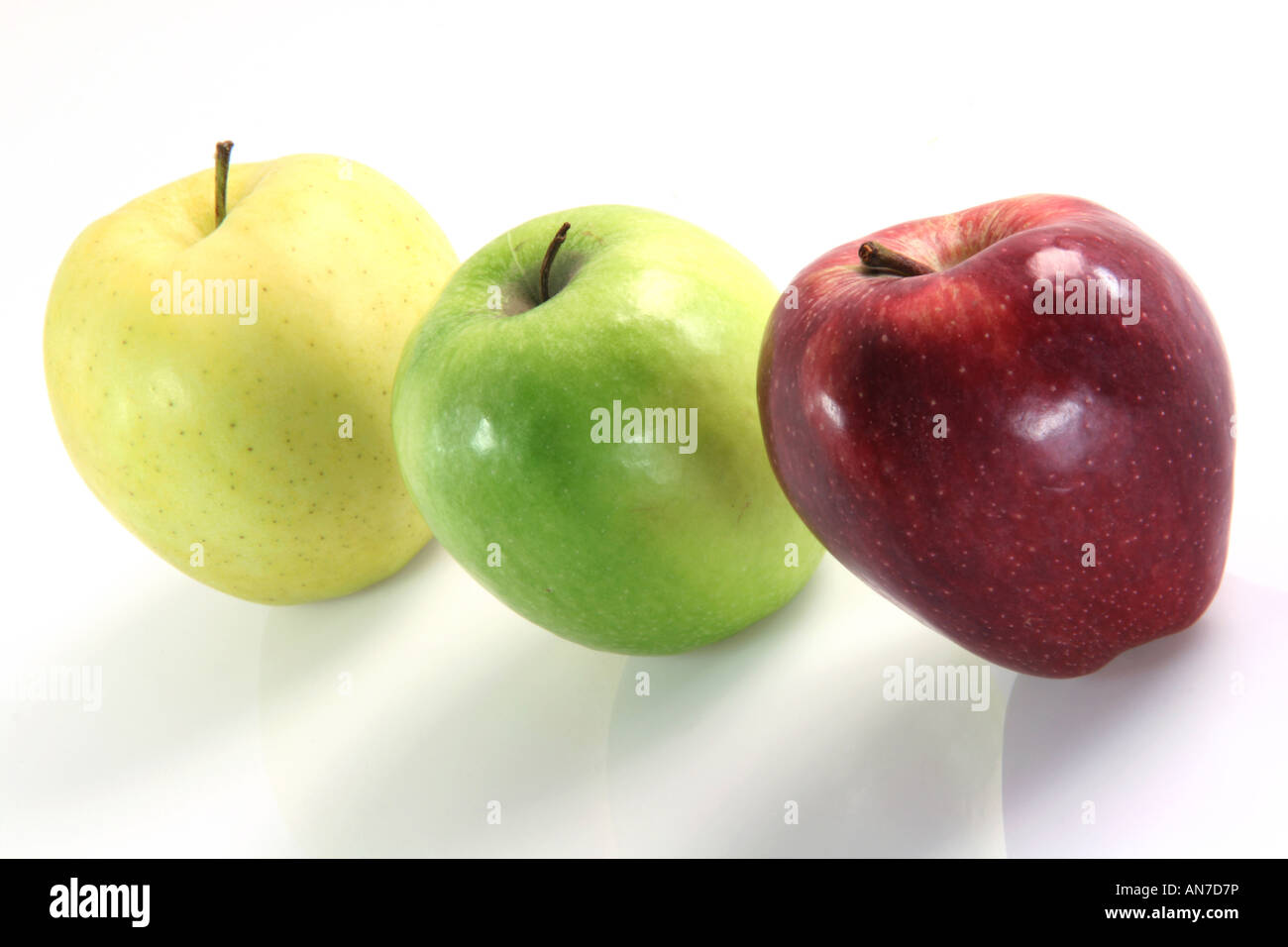 three apples yellow green and red isolated diet healthy food and ...