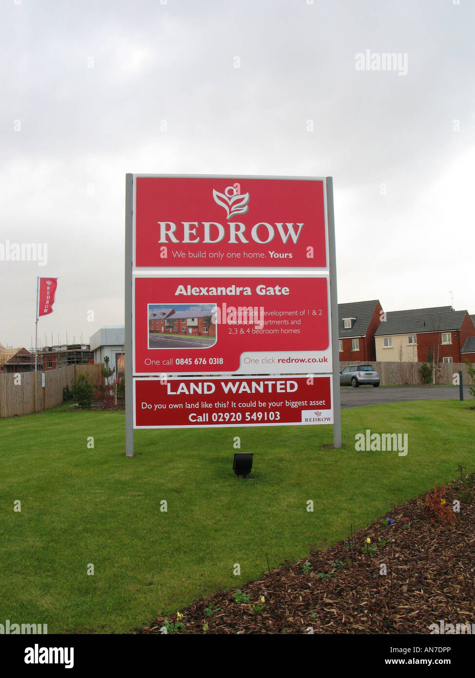 A sign advertising a new Redrow development in Newport, South Wales ...