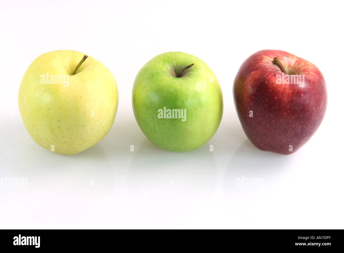 three apples yellow green and red isolated diet healthy food and ...
