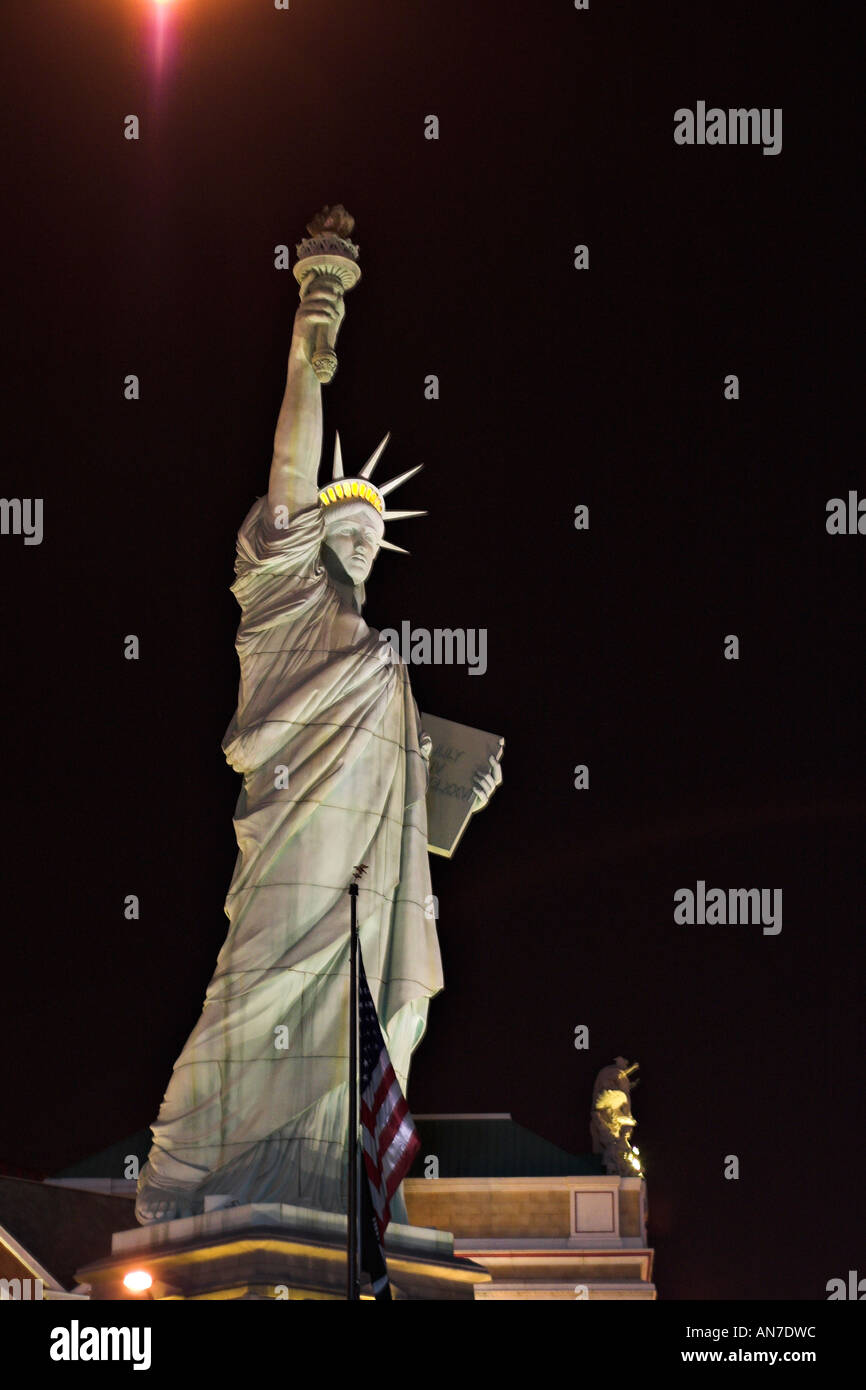 Statue of Liberty replica from below with the night sky pierced by a ...