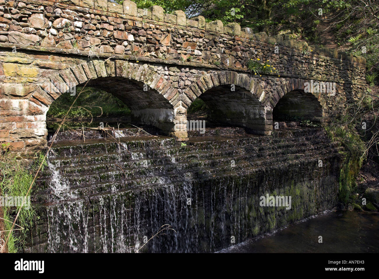Stone bridge over Quarlton Brook in the Lancashire village of Edgworth ...