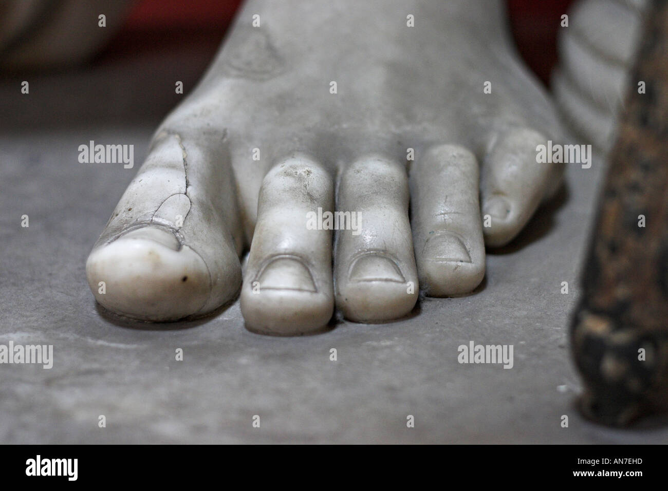 The carved foot of a large marble statue in the Vatican museum Stock ...