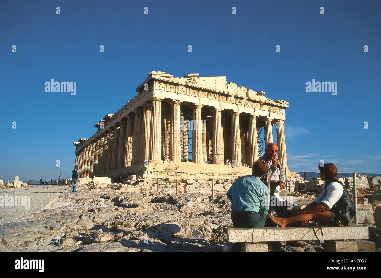 A view of the Parthenon as the evening shadows lengthen and most of the ...
