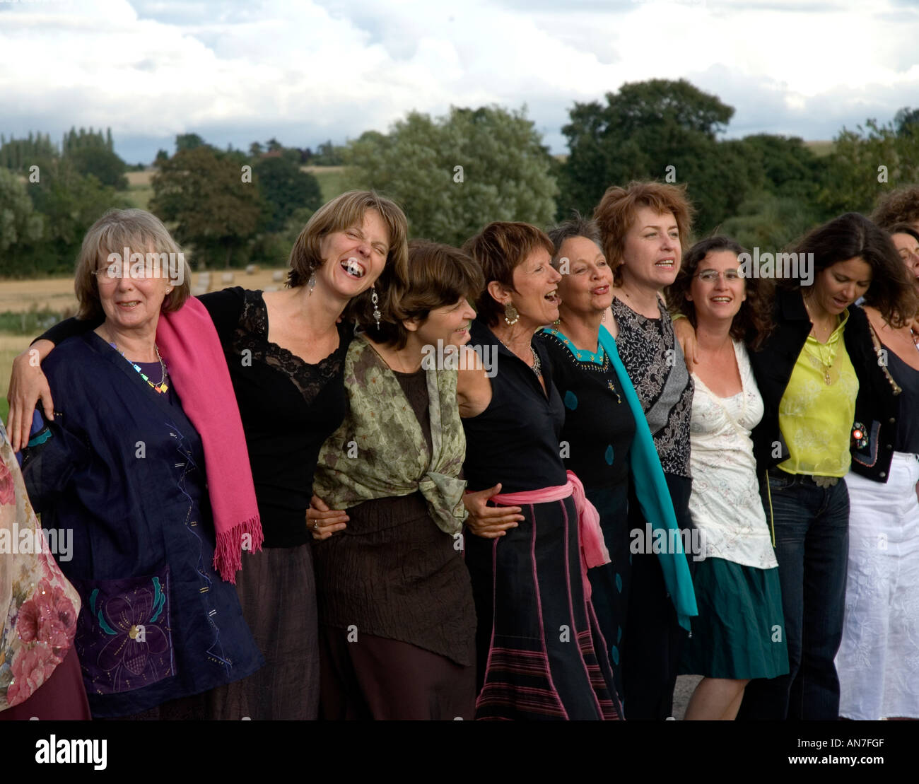 Women linking arms together Richard Moss seminar Poulstone Court ...