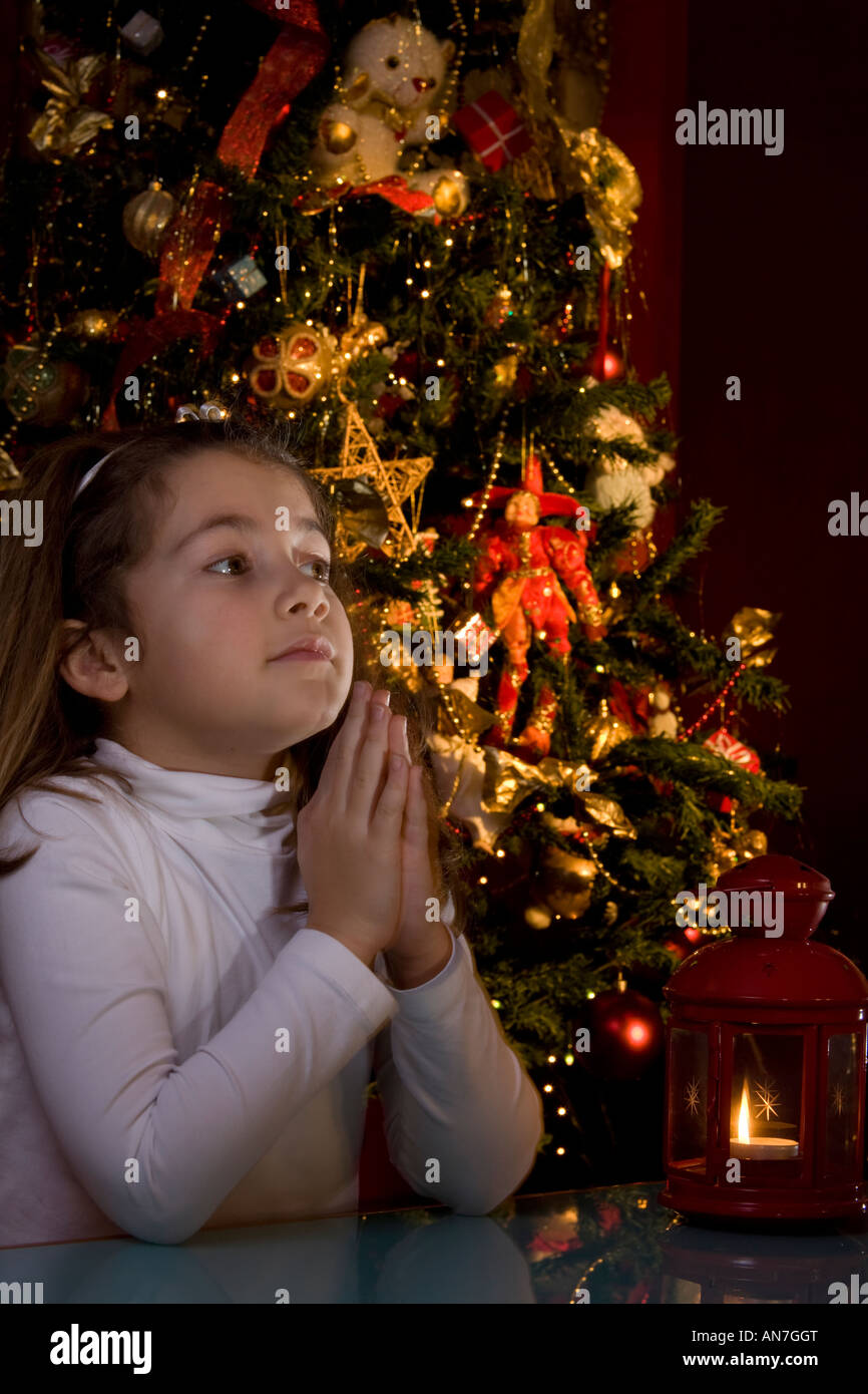 Christmas prayers for a little child Stock Photo - Alamy