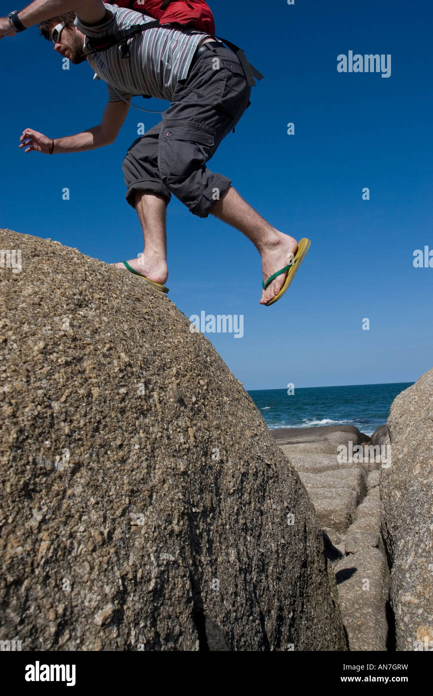 Stepping across rocks hi-res stock photography and images - Alamy