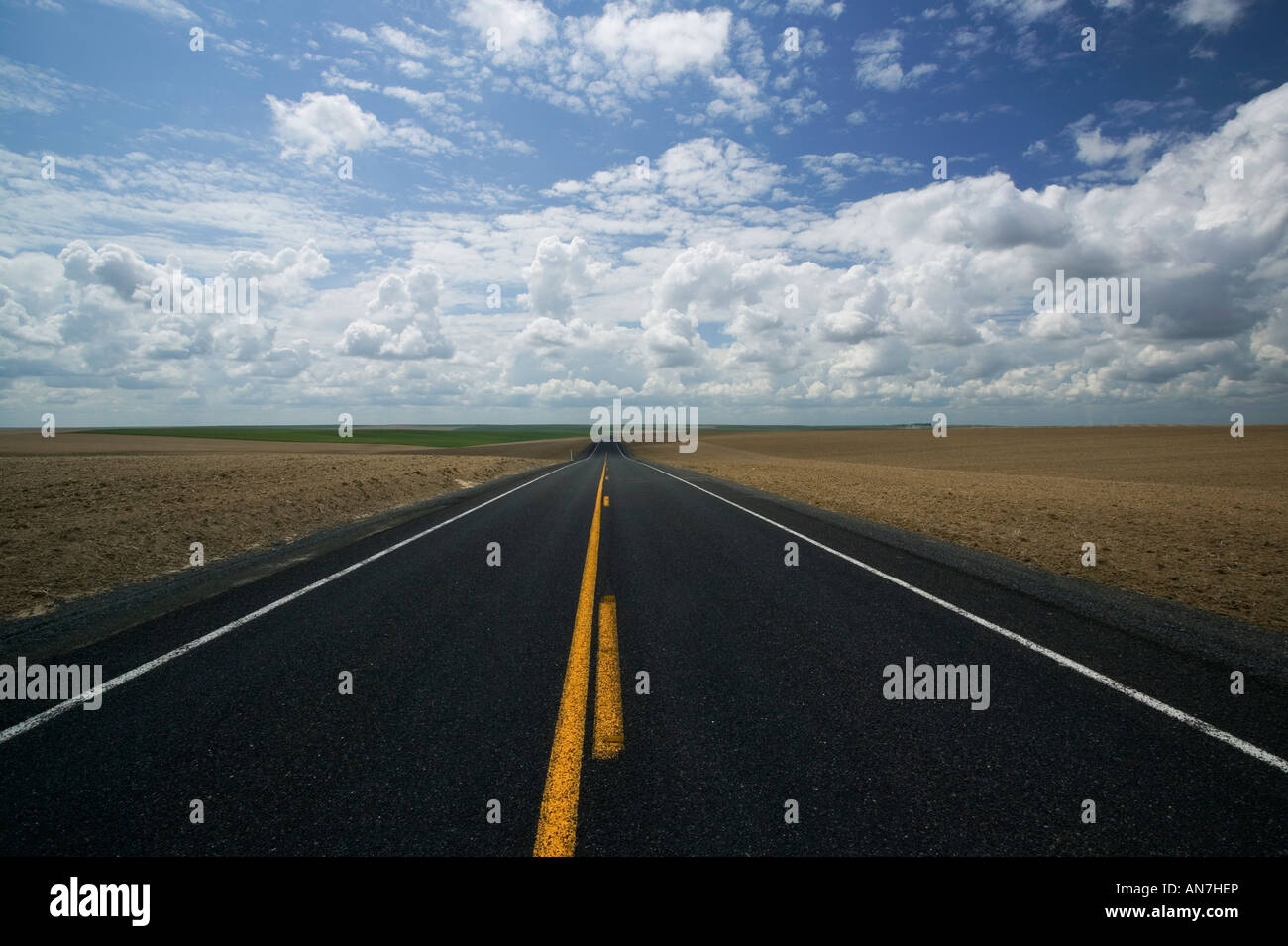 Highway in the fields Stock Photo - Alamy