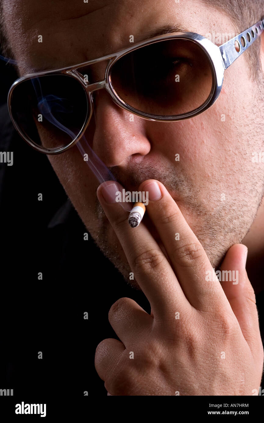 Smoking a cigarette Stock Photo - Alamy