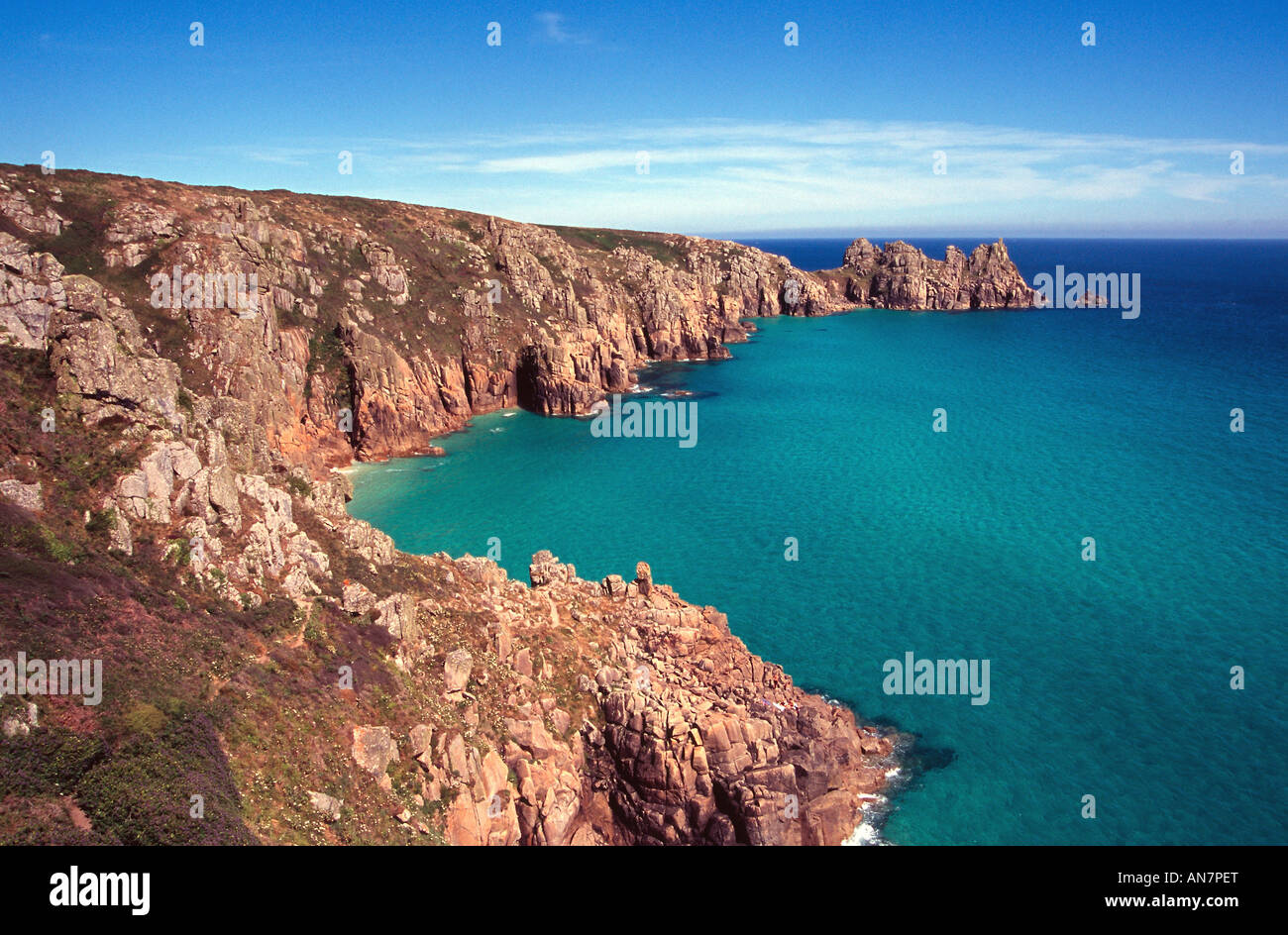 porthcurno high tide logans rock turquoise seas from coastal path ...
