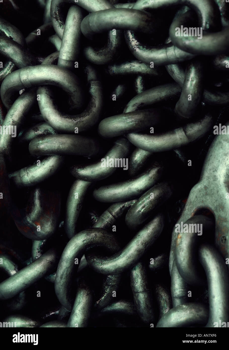 Chains with heavy links dark and moody image bound Stock Photo - Alamy