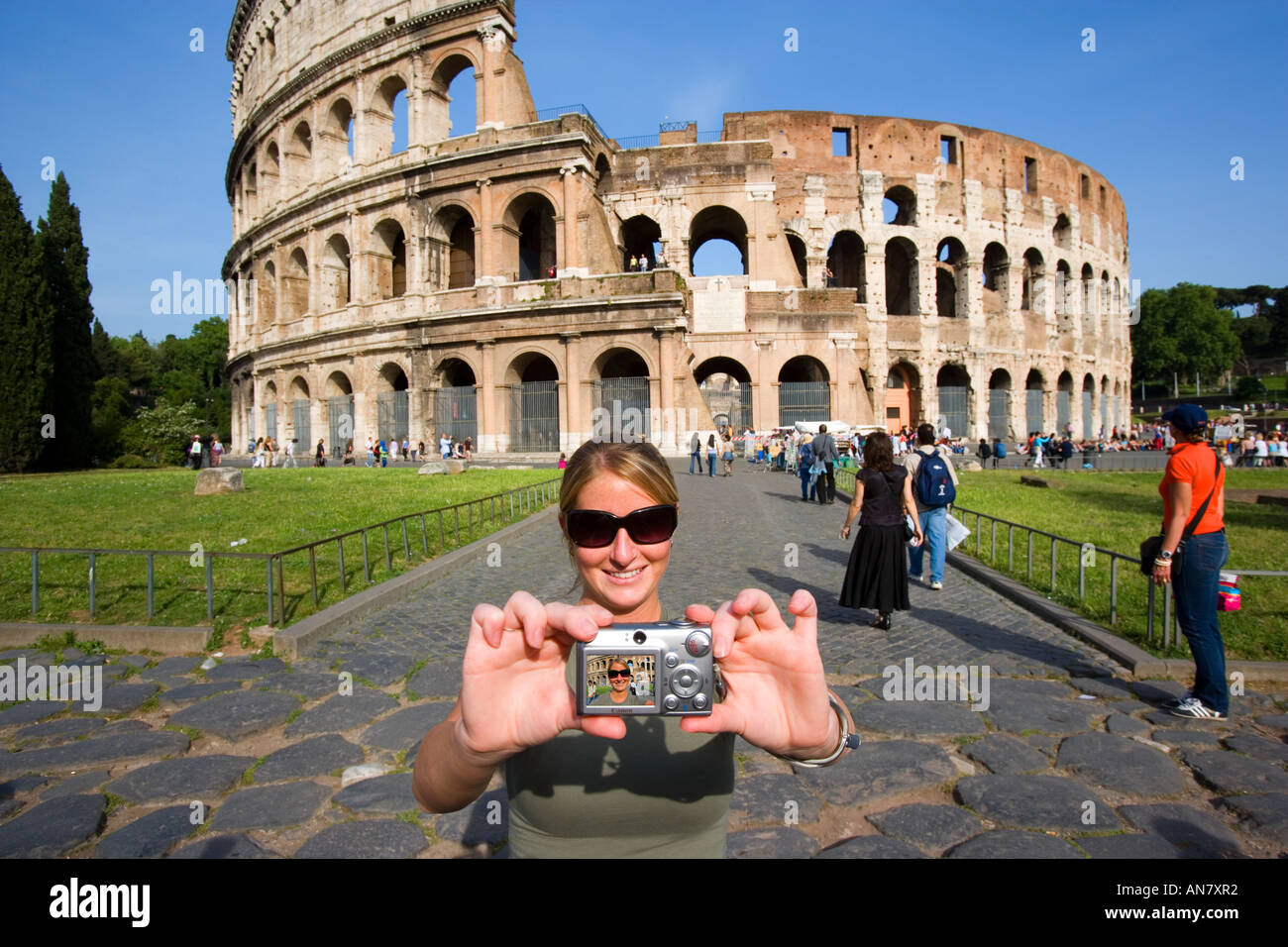 Italy Rome Tourist photographing the Colosseum Stock Photo - Alamy