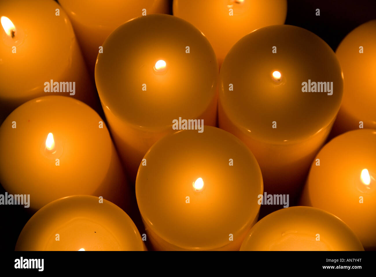 Candles viewed from above in darkness Stock Photo - Alamy
