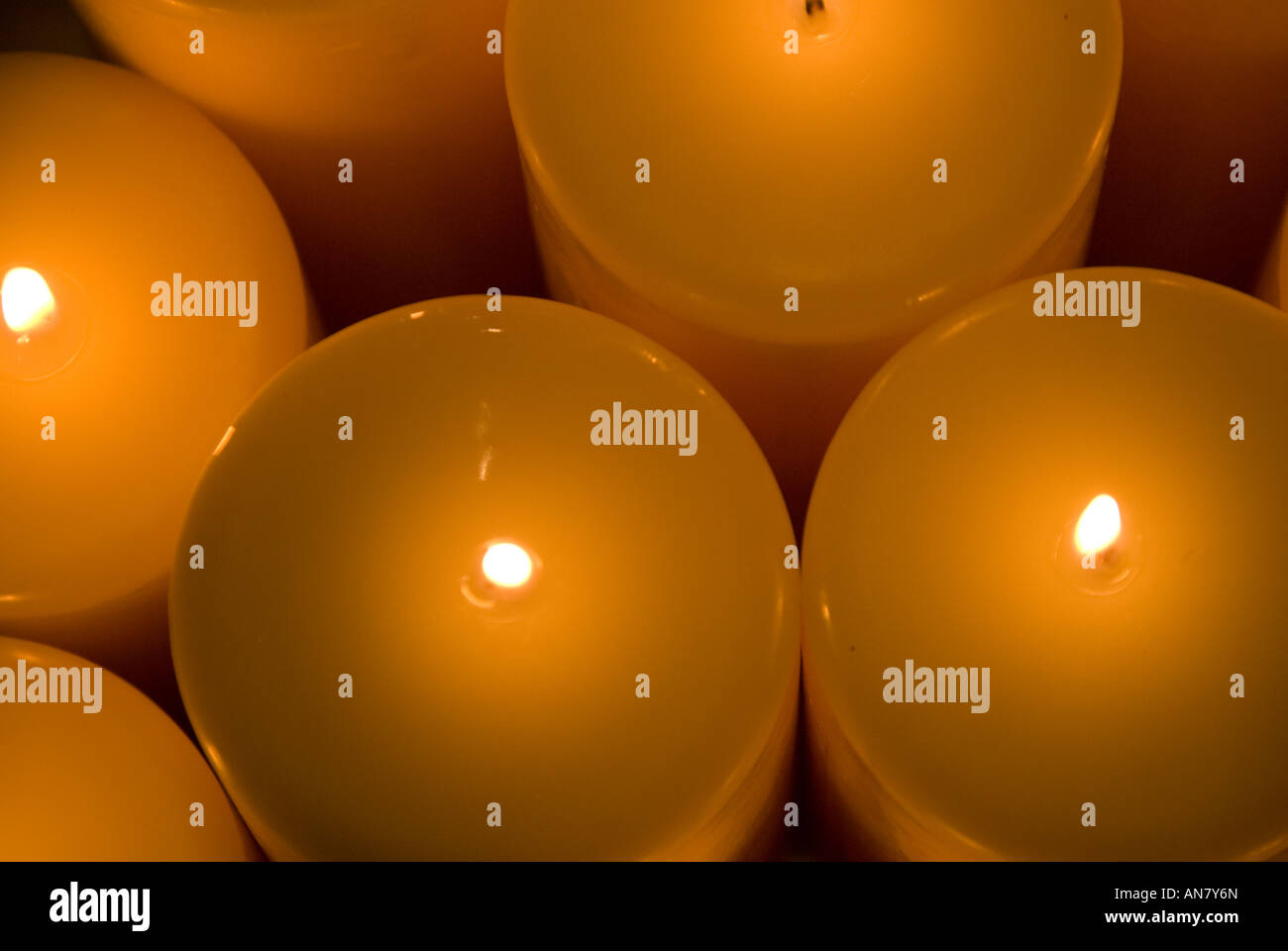 Candles viewed from above in darkness Stock Photo - Alamy