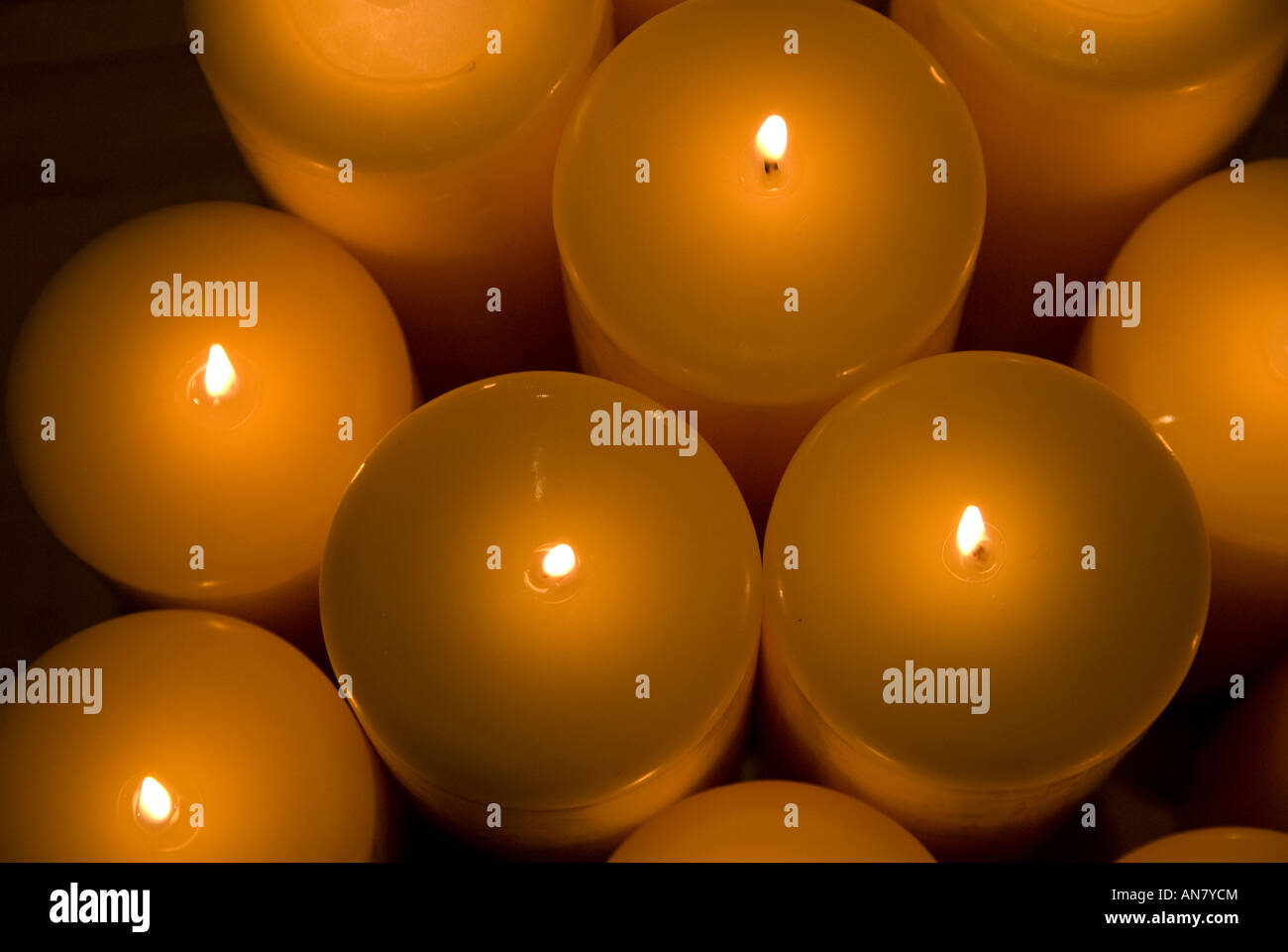Candles viewed from above in darkness Stock Photo - Alamy