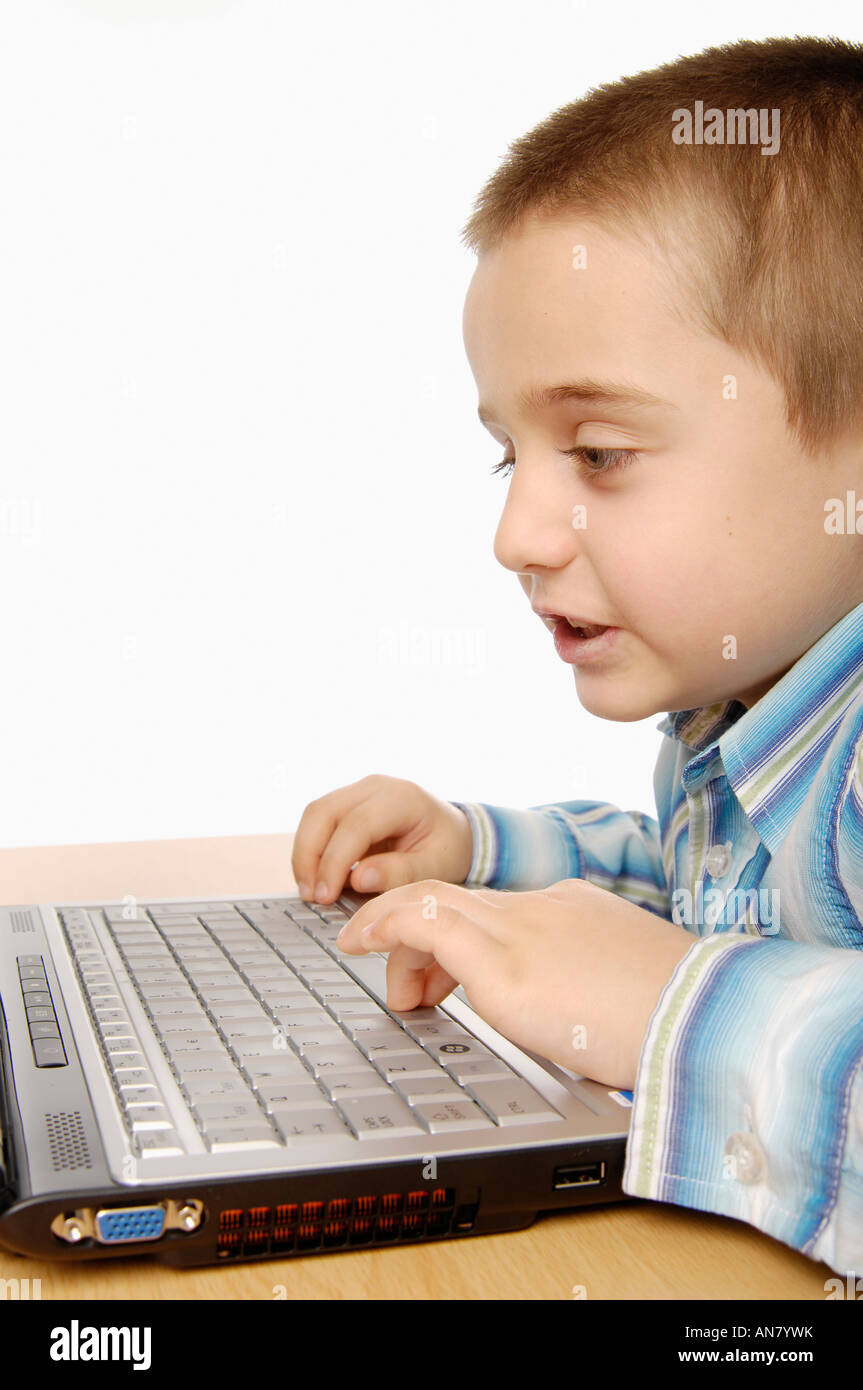 Boy with laptop Stock Photo - Alamy