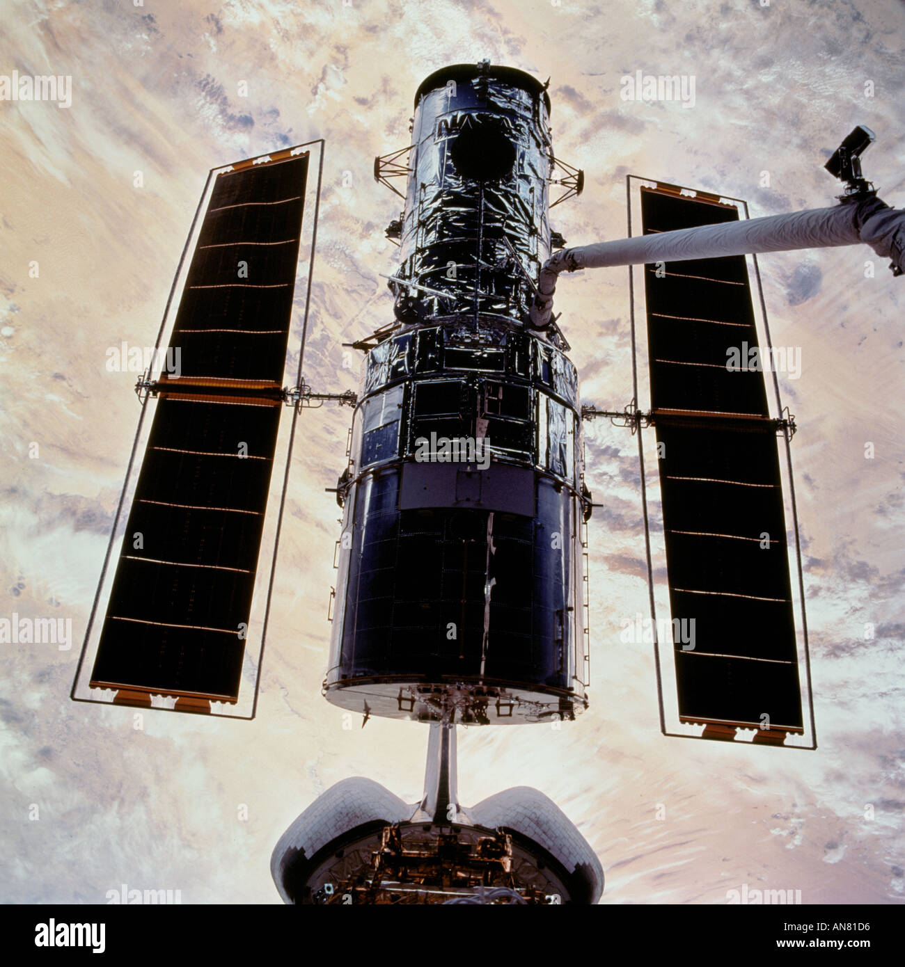 Hubble Space Telescope HST backdropped against a horizon scene while in ...