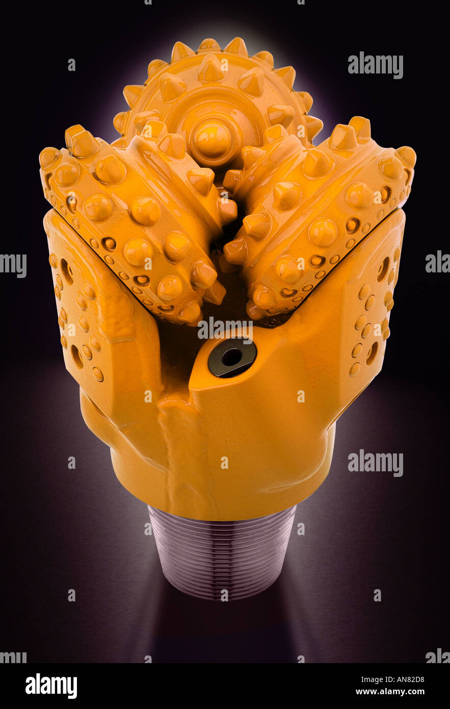 oil field drilling bit on dark background Stock Photo - Alamy