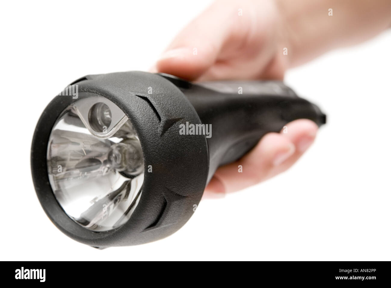 Hand holding a flashlight. Isolated on a white background Stock Photo ...