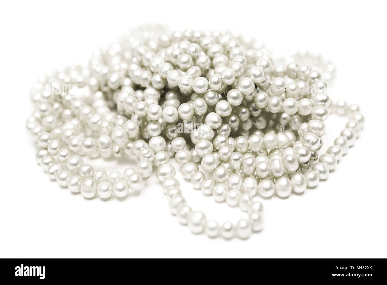 Precious pearl necklace. White background Stock Photo - Alamy