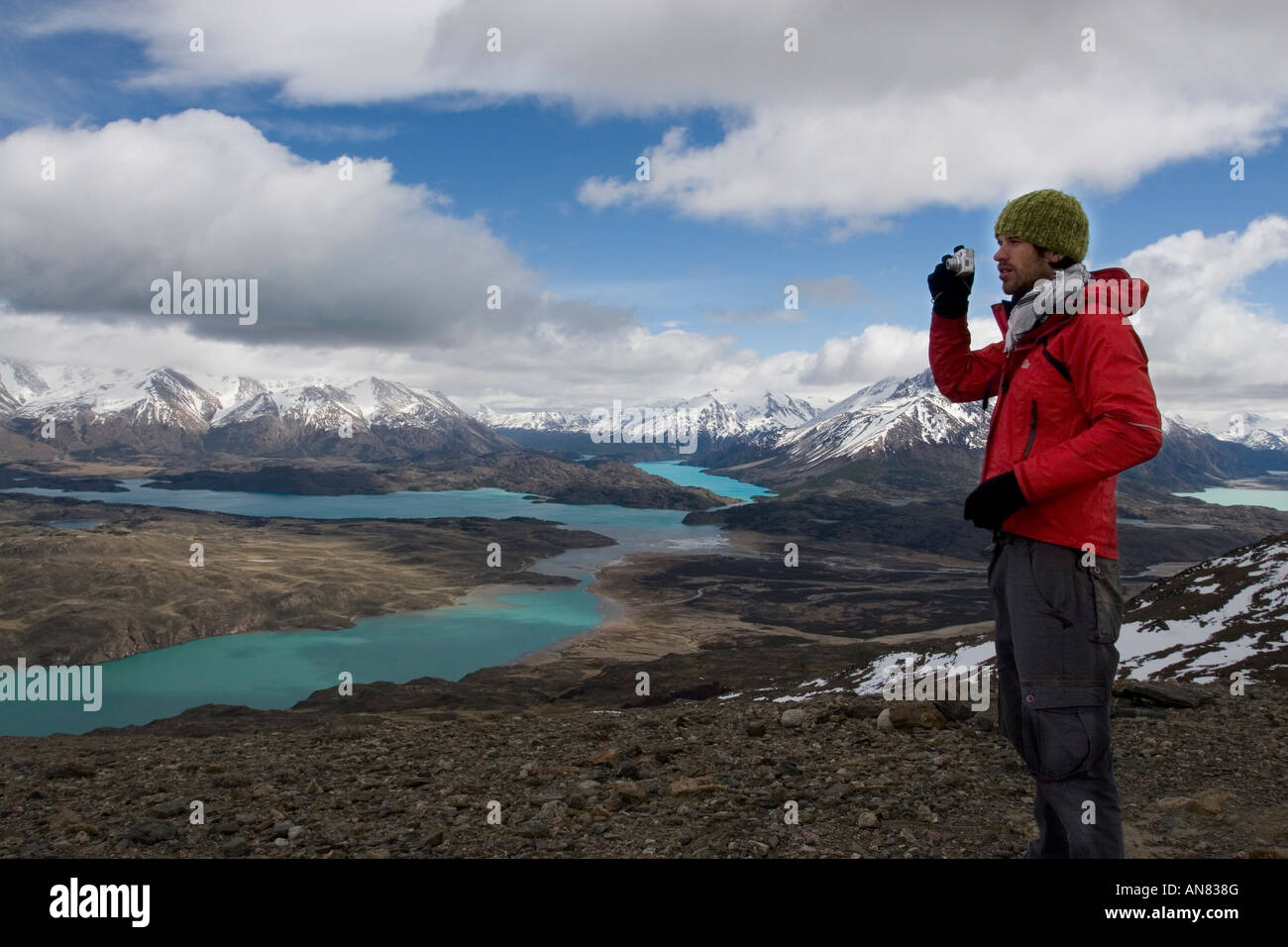 Man with Camera on Hill Stock Photo - Alamy