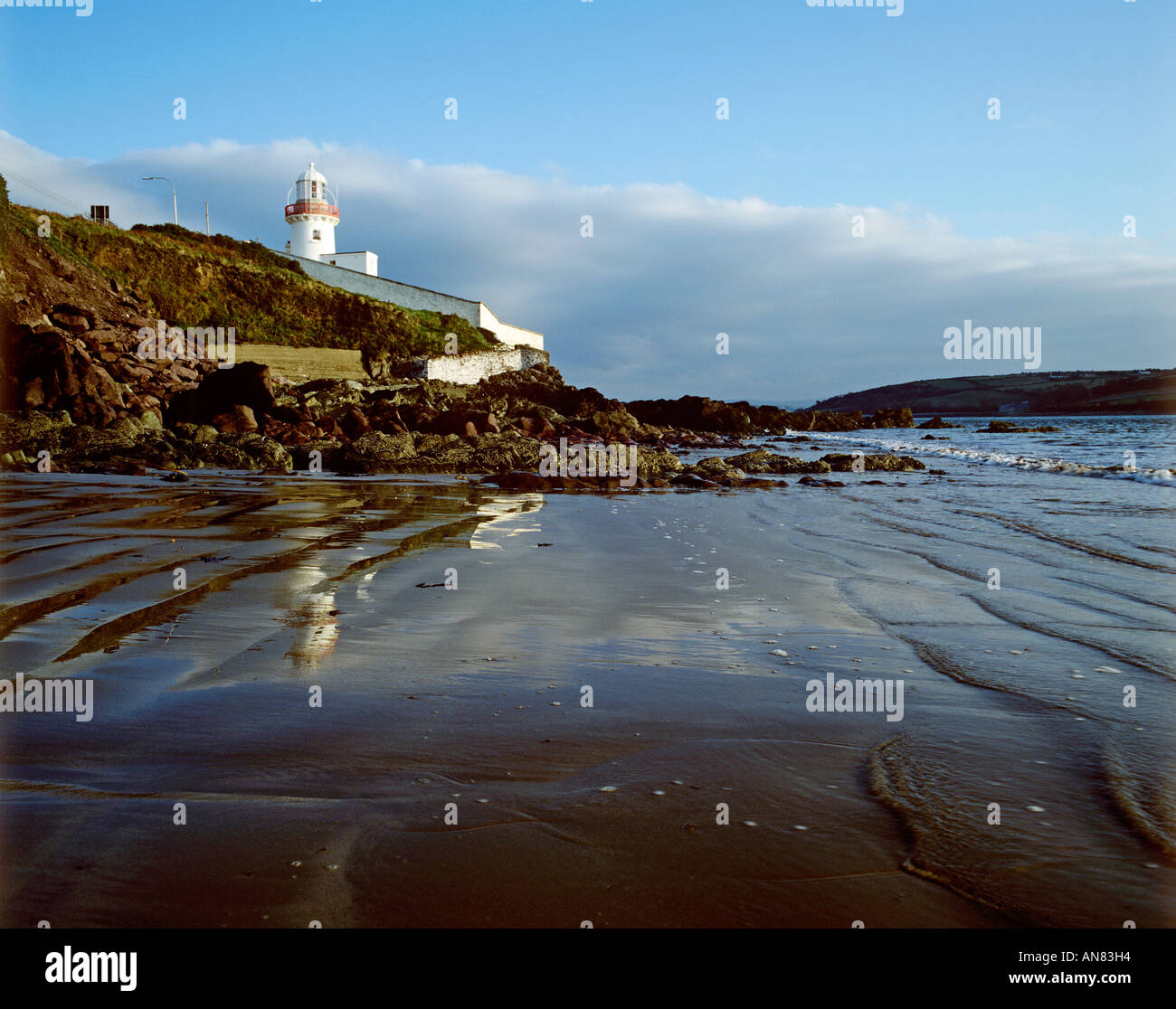 A lighthouse on a promontory in the estuary of the Blackwater river ...