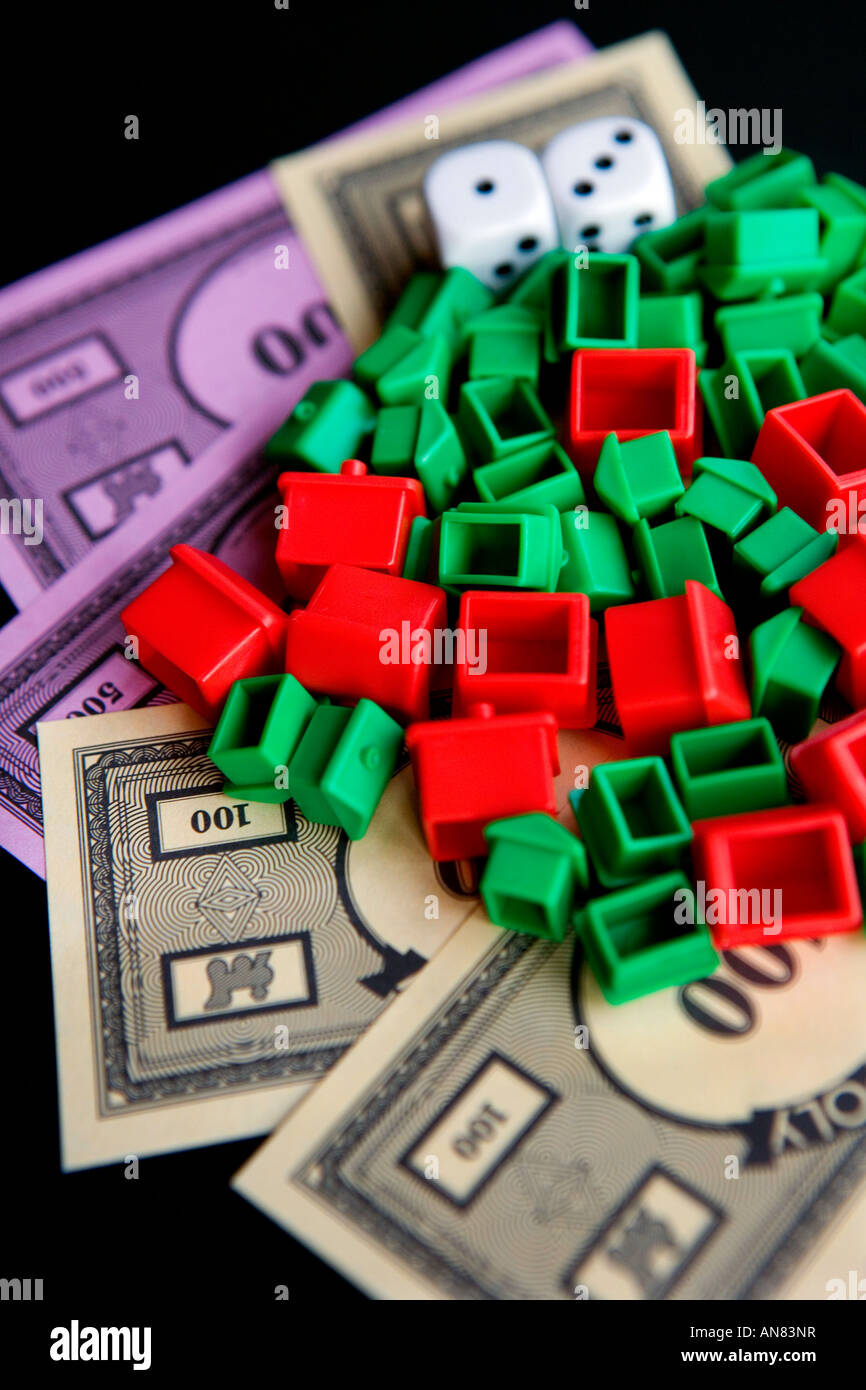 MONOPOLY DICE, MONEY, HOUSES AND HOTELS Stock Photo - Alamy