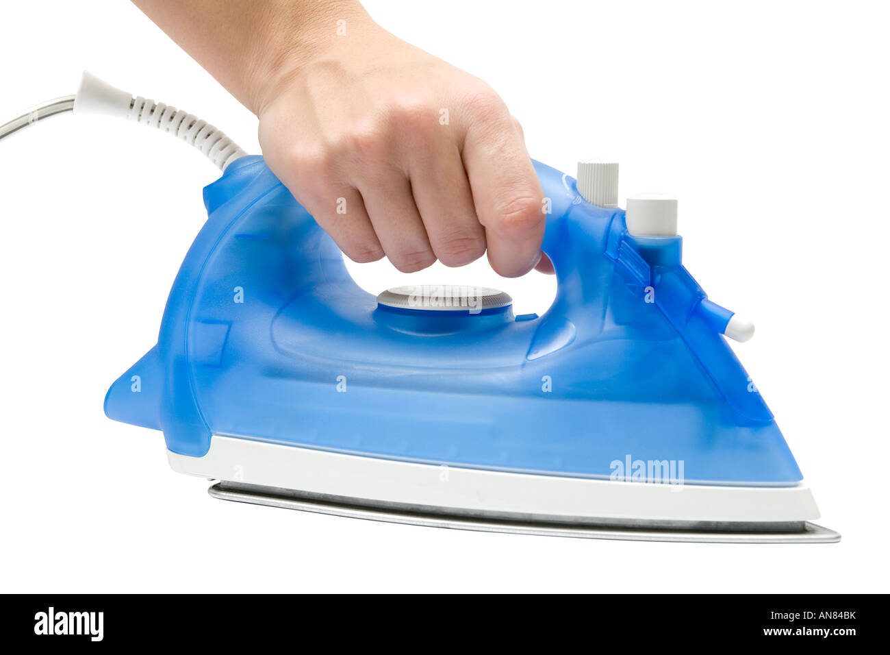 Female hand holding a blue iron. Isolated on a white background Stock ...