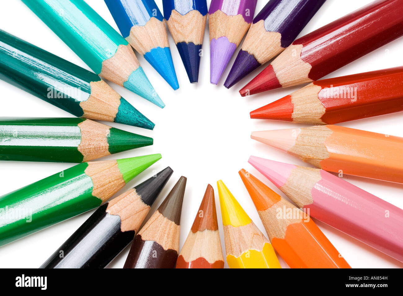 Colored pencils forming a color circle. White background Stock Photo ...