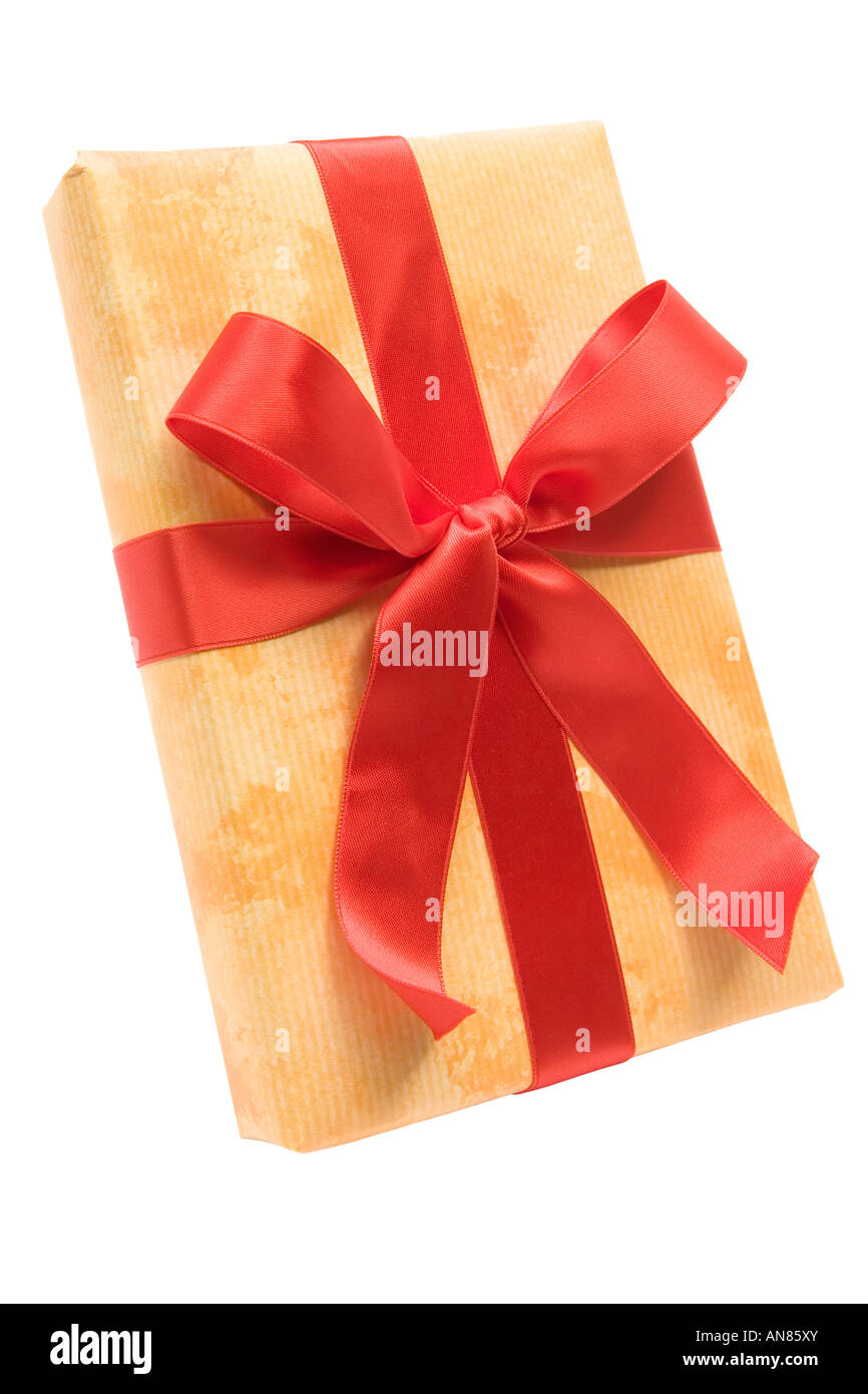 Yellow christmas gift with red ribbon and bow. Isolated on a white ...