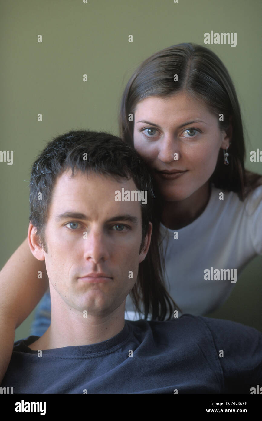 Interior portrait of male & female 20 to 29 years couple Stock Photo ...
