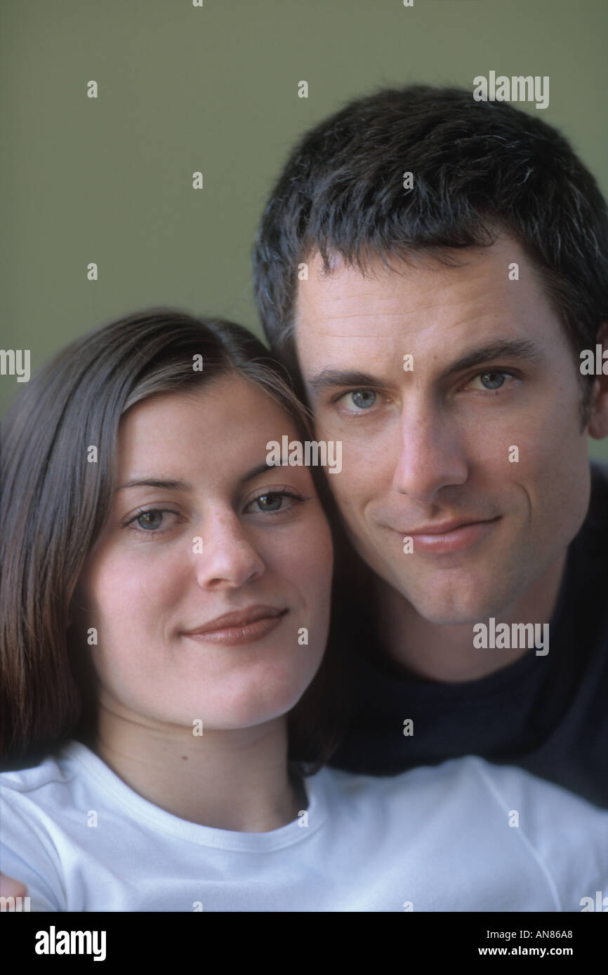 Interior portrait of male & female 20 to 29 years couple Stock Photo ...