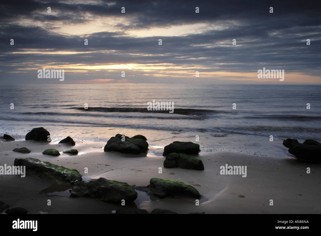 Rocky Beach Sunset Hunstanton Stock Photo - Alamy