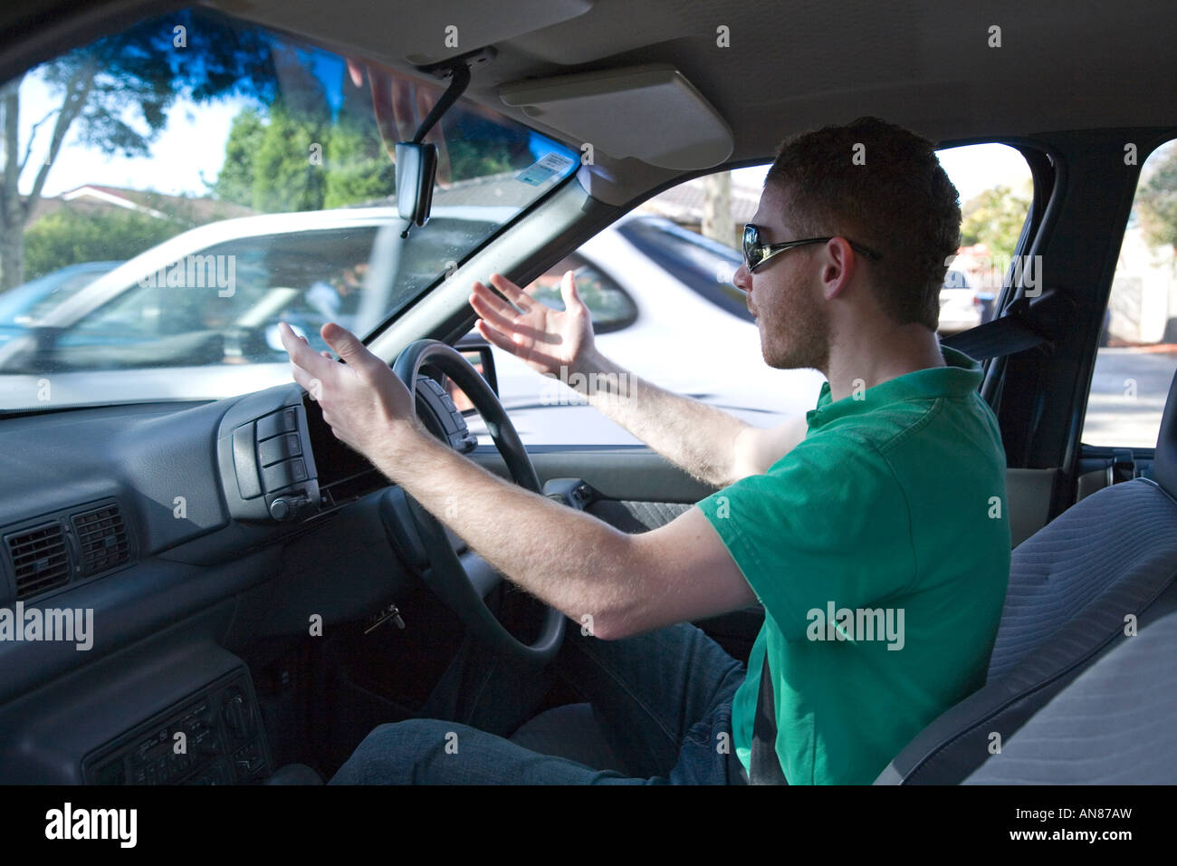 young man with road rage anger Stock Photo - Alamy