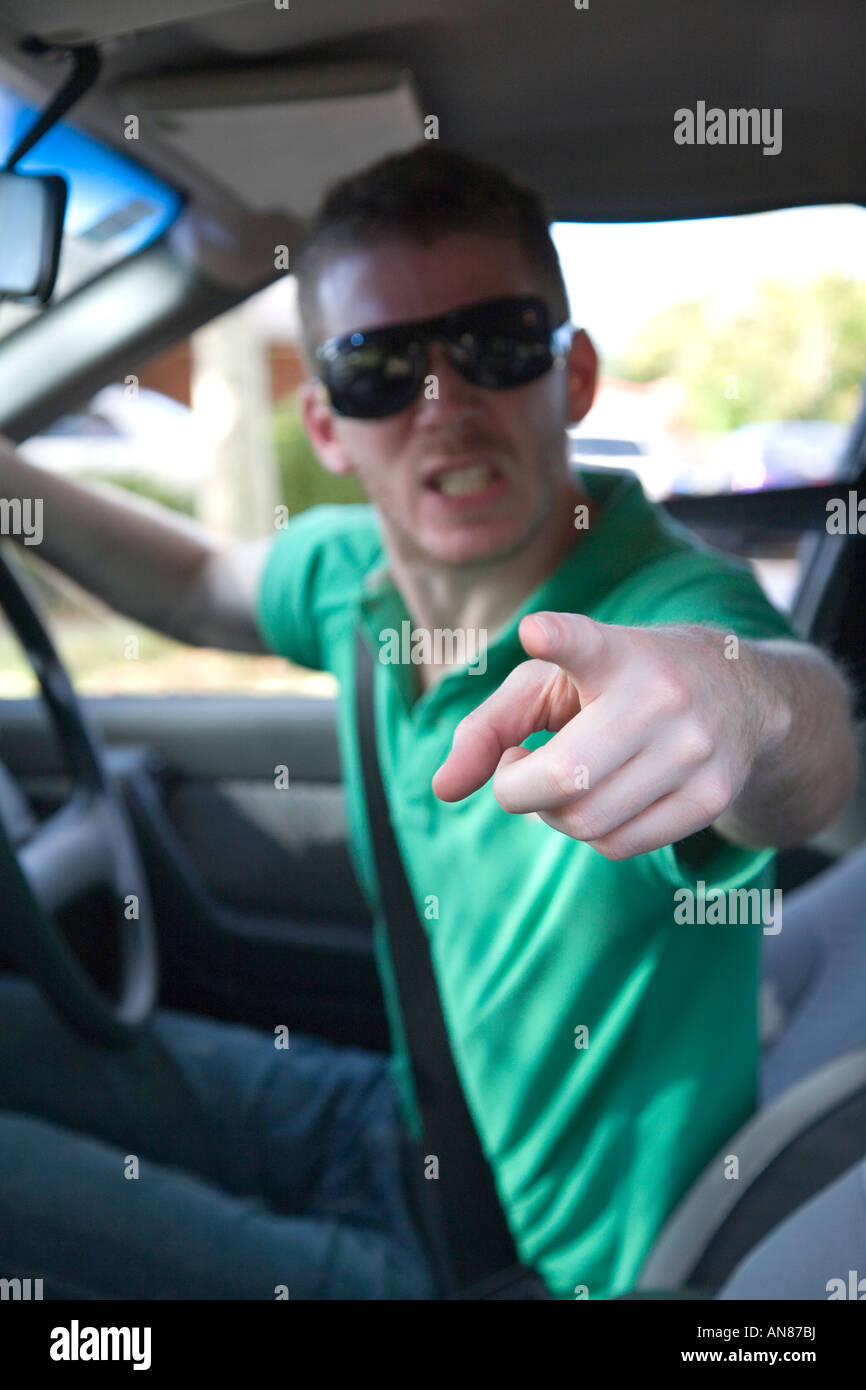 young man with road rage anger Stock Photo - Alamy