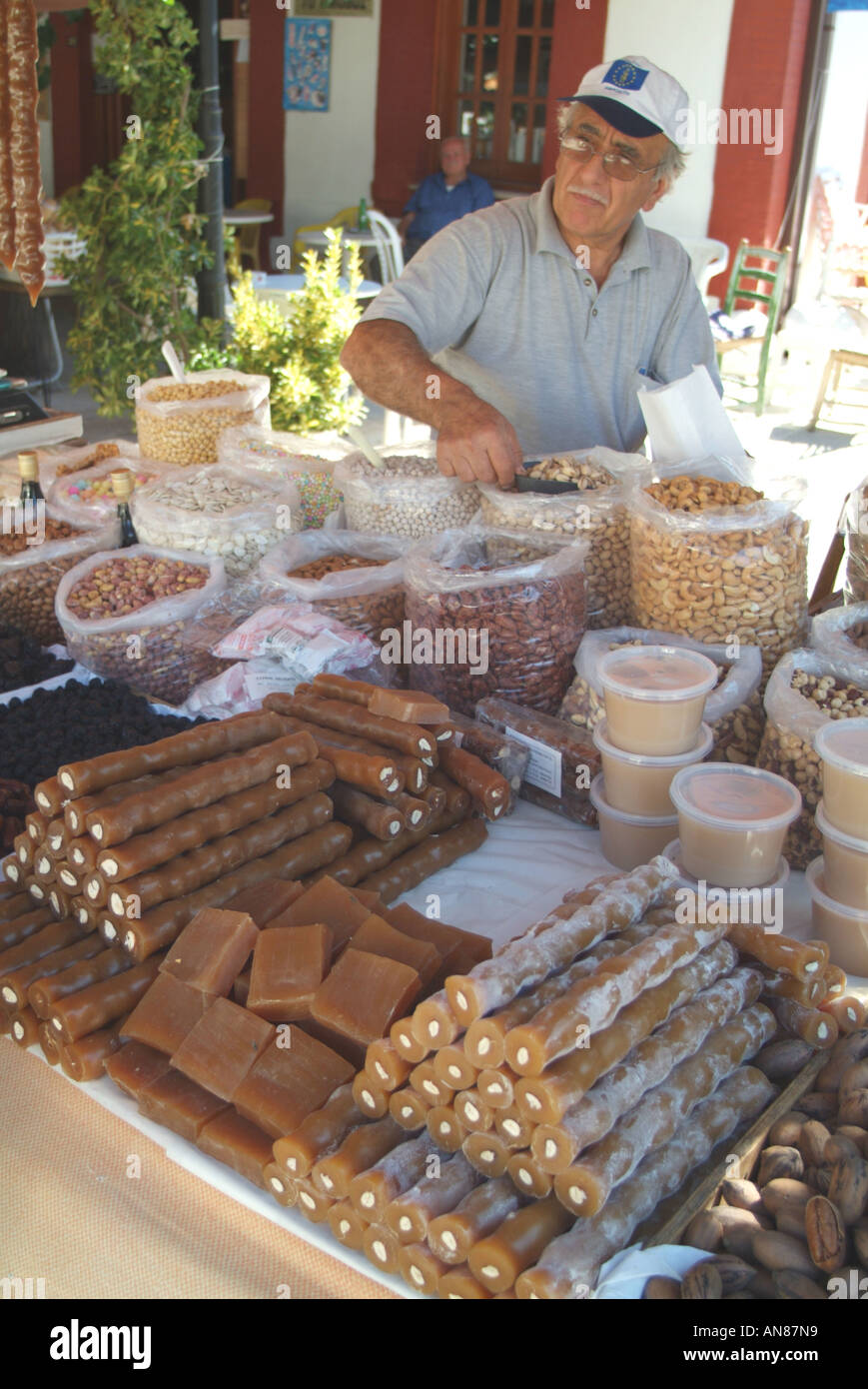 man selling nuts Omodos Stock Photo - Alamy