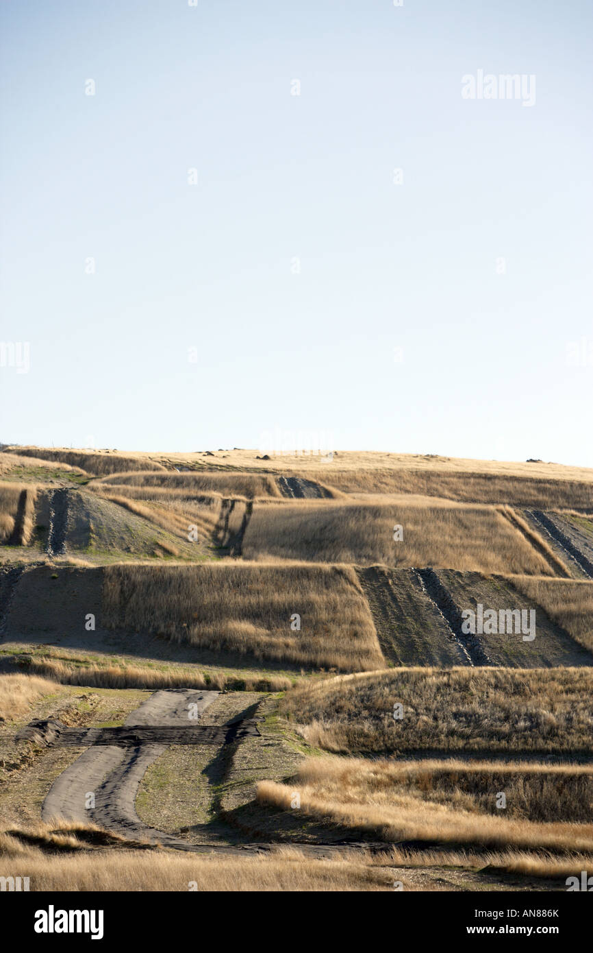 Land that has been terraced and leveled waiting for homes to be built ...