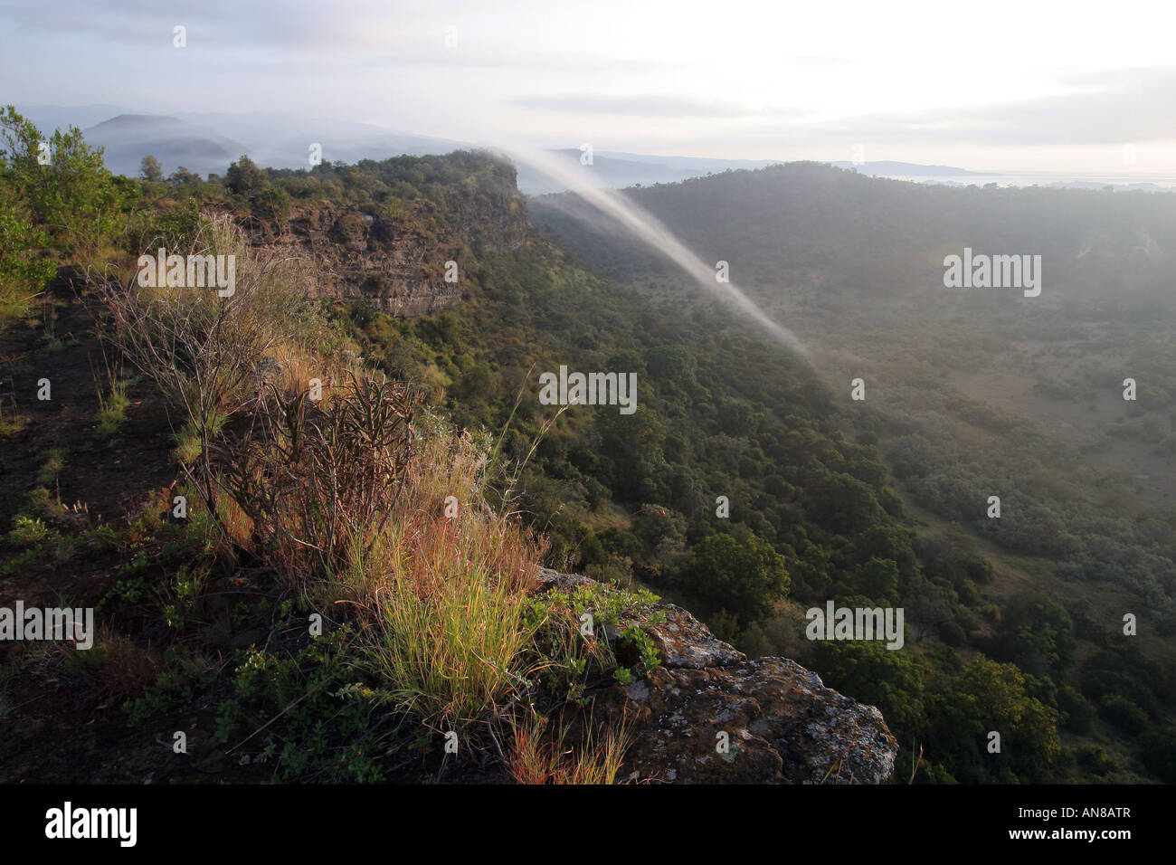 cloud flowing over ridge Stock Photo - Alamy
