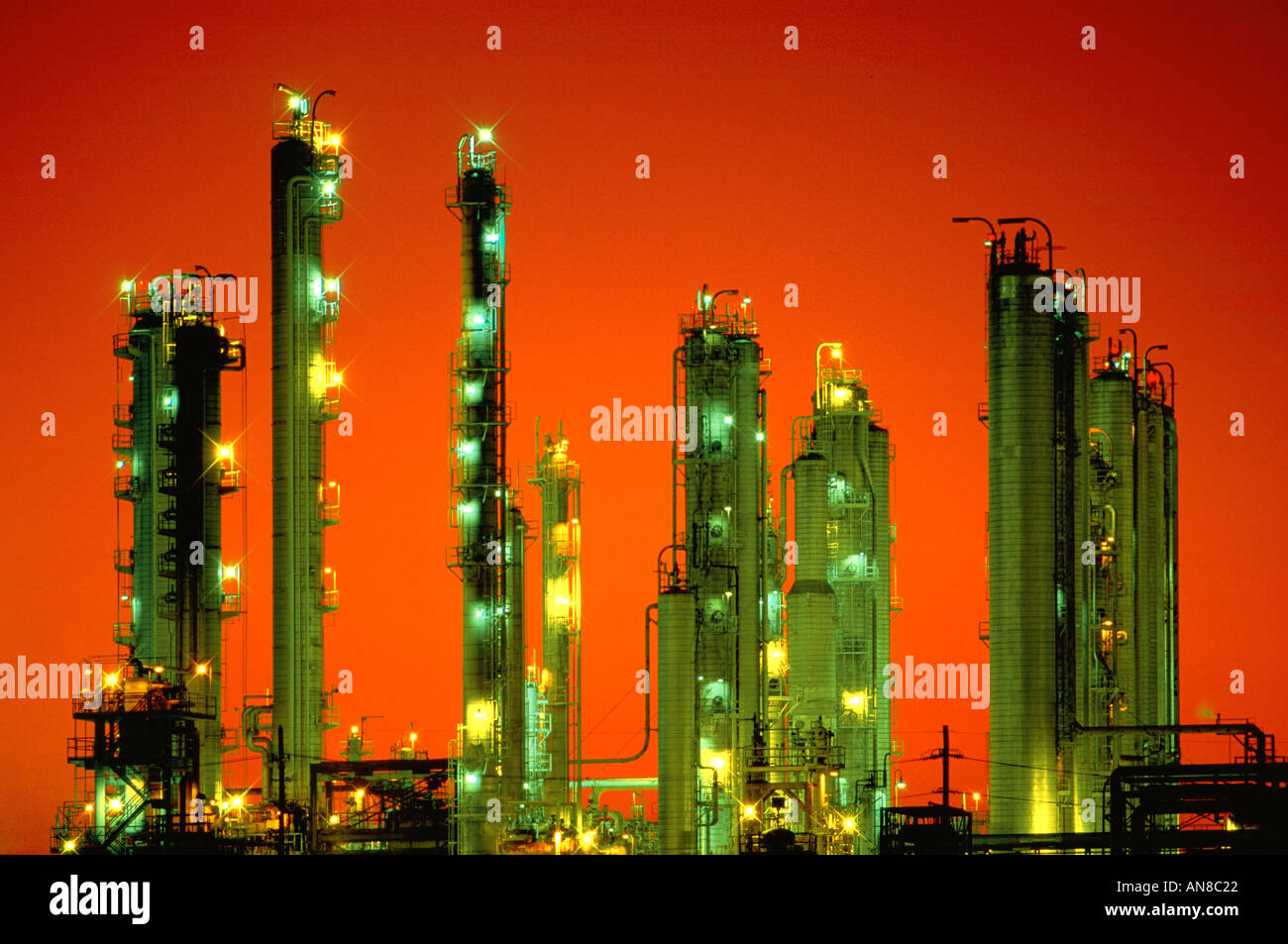 Glowing Towers at oil refinery Stock Photo - Alamy