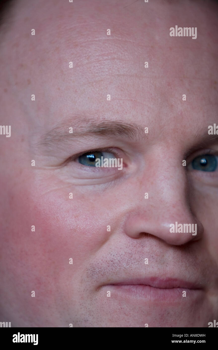 A young man looking confidently towards the future Stock Photo - Alamy