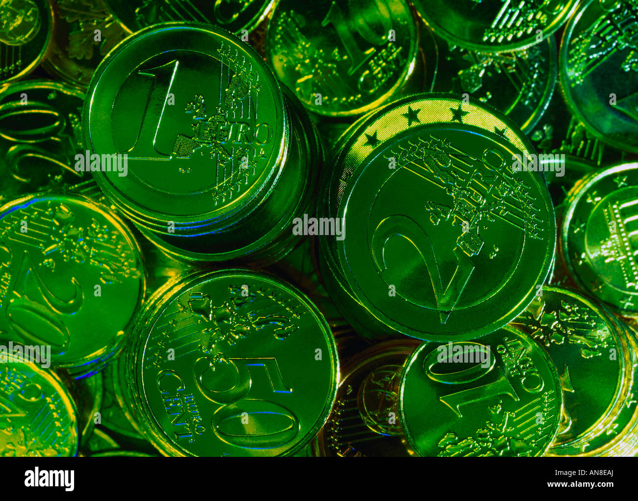 European coins in green light Stock Photo - Alamy