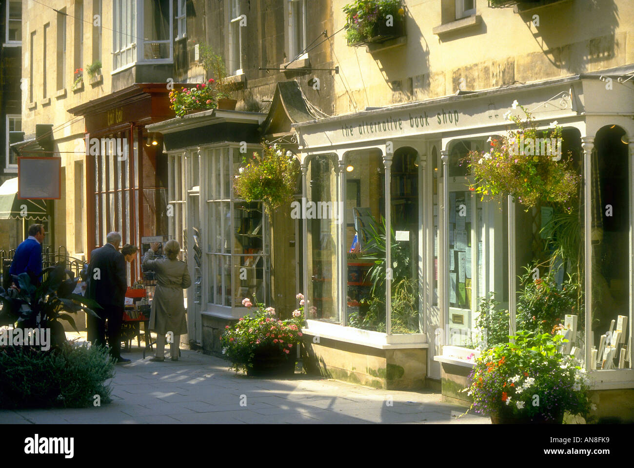 People standing in the alley outside the shops in Margaret s buildings ...