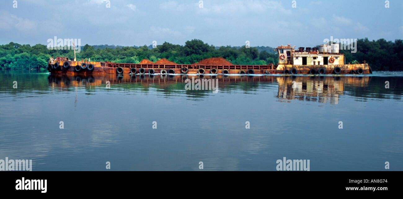 Self propelled ore barge on Mandovi river. Goa, India Stock Photo - Alamy